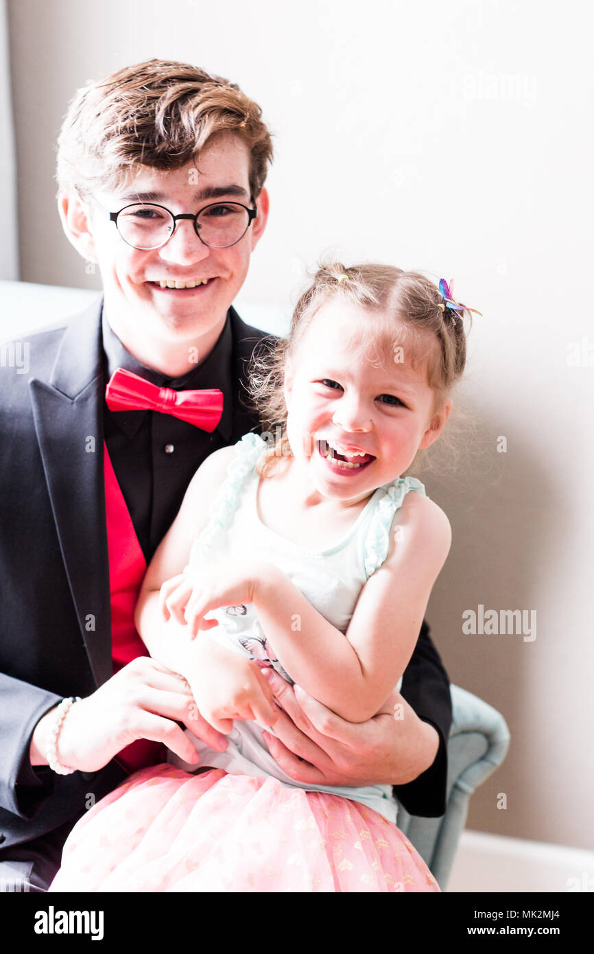 Older brother with younger sister before his senior prom Stock Photo ...