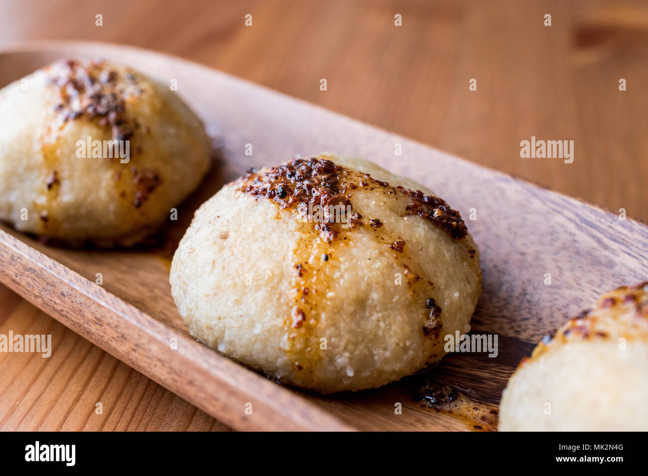 icli kofte / Boiled kibbeh / Quibe with butter sauce. turkish or ...