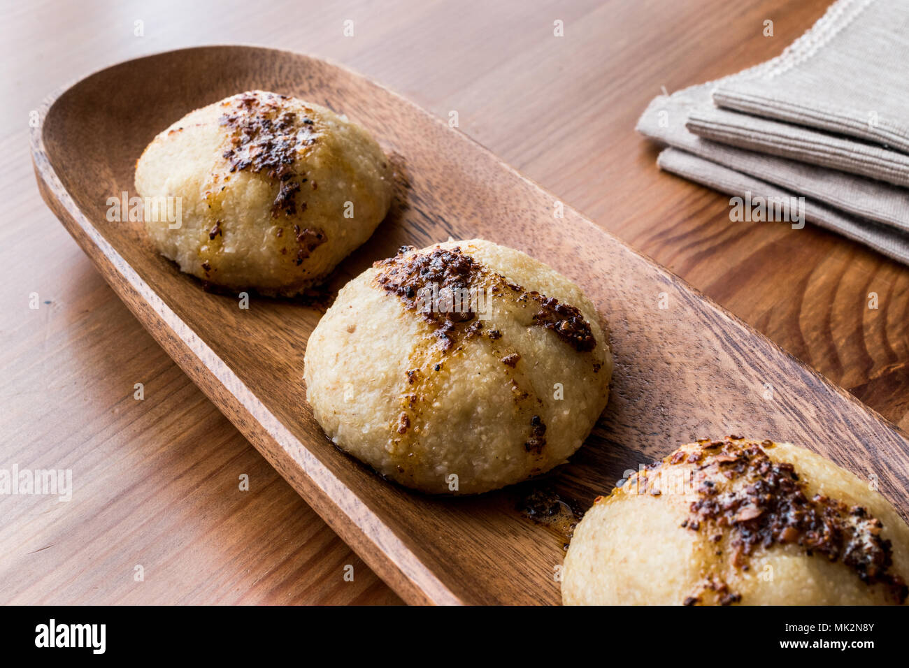 icli kofte / Boiled kibbeh / Quibe with butter sauce. turkish or ...