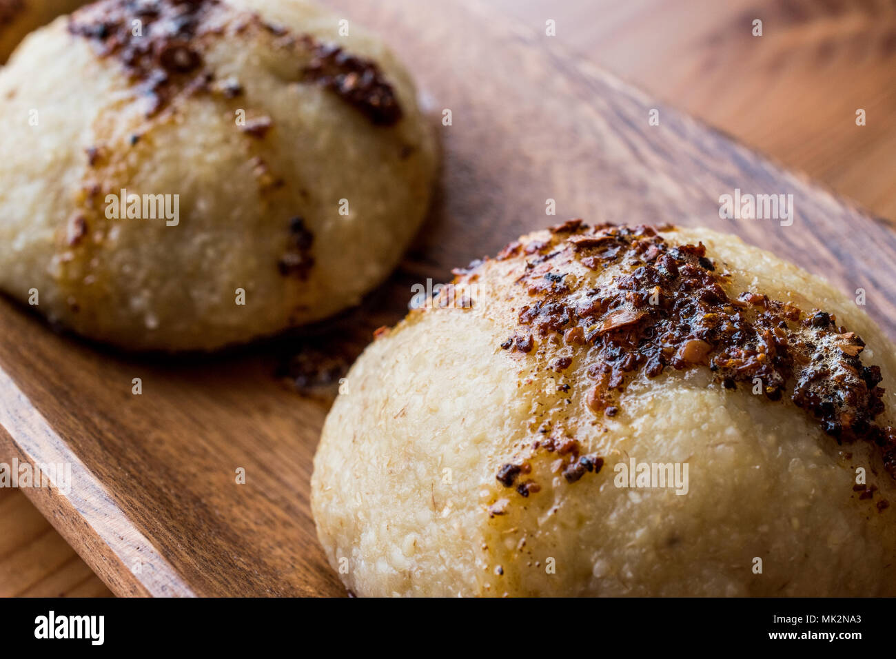 icli kofte / Boiled kibbeh / Quibe with butter sauce. turkish or ...