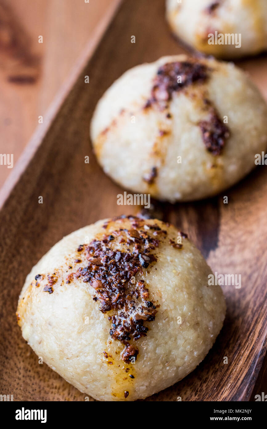 icli kofte / Boiled kibbeh / Quibe with butter sauce. turkish or ...