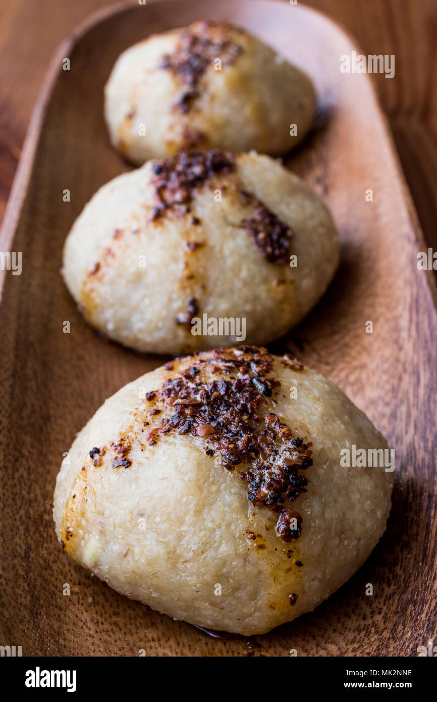 icli kofte / Boiled kibbeh / Quibe with butter sauce. turkish or ...