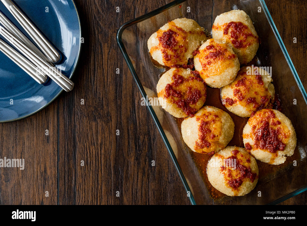 icli kofte / Boiled kibbeh / Quibe with tomato paste sauce. Traditional ...