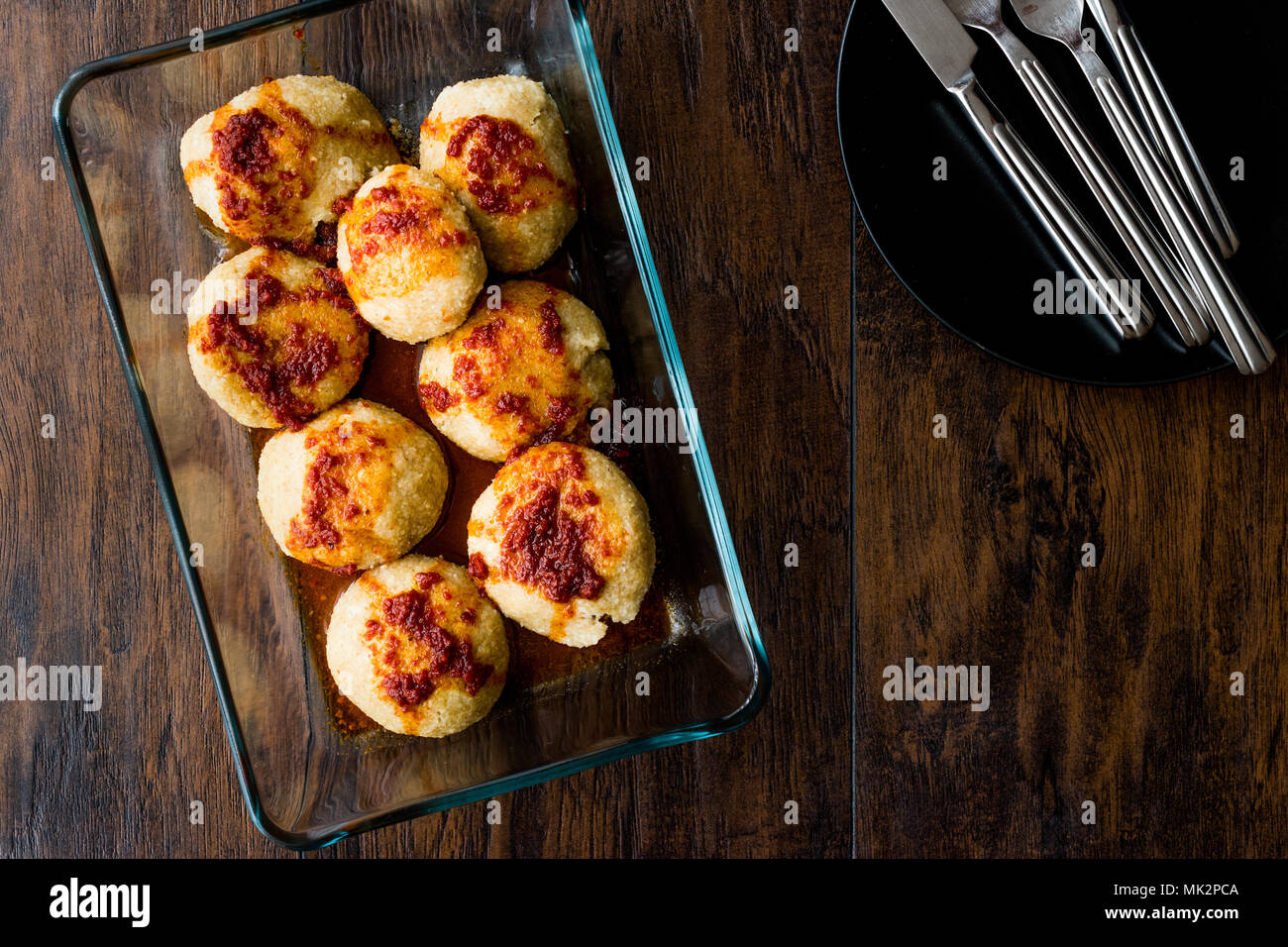 icli kofte / Boiled kibbeh / Quibe with tomato paste sauce. Traditional ...