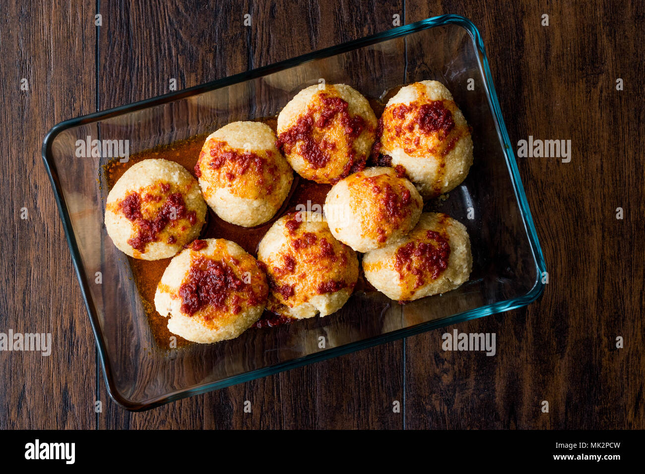 icli kofte / Boiled kibbeh / Quibe with tomato paste sauce. Traditional ...