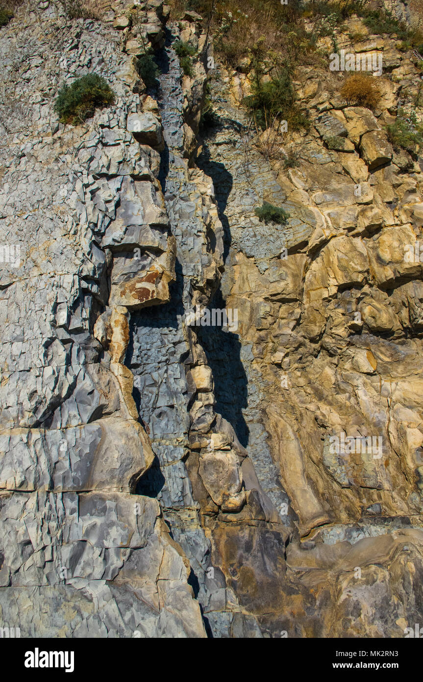 rock formations and stones of the sea coast, weathered and smoothed by ...