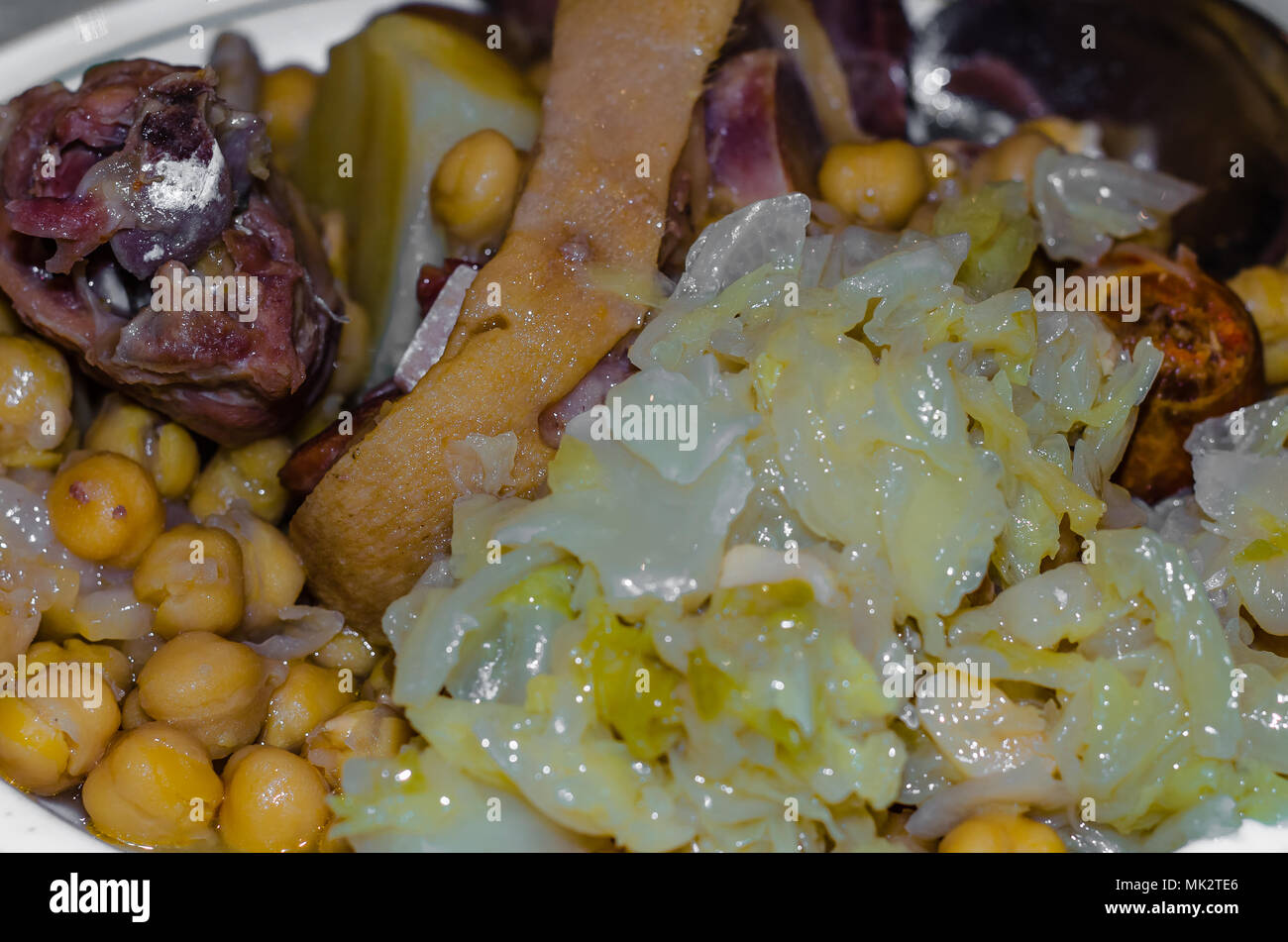 A plate of traditional dish from Madrid, Spain called cocido madrileno ...