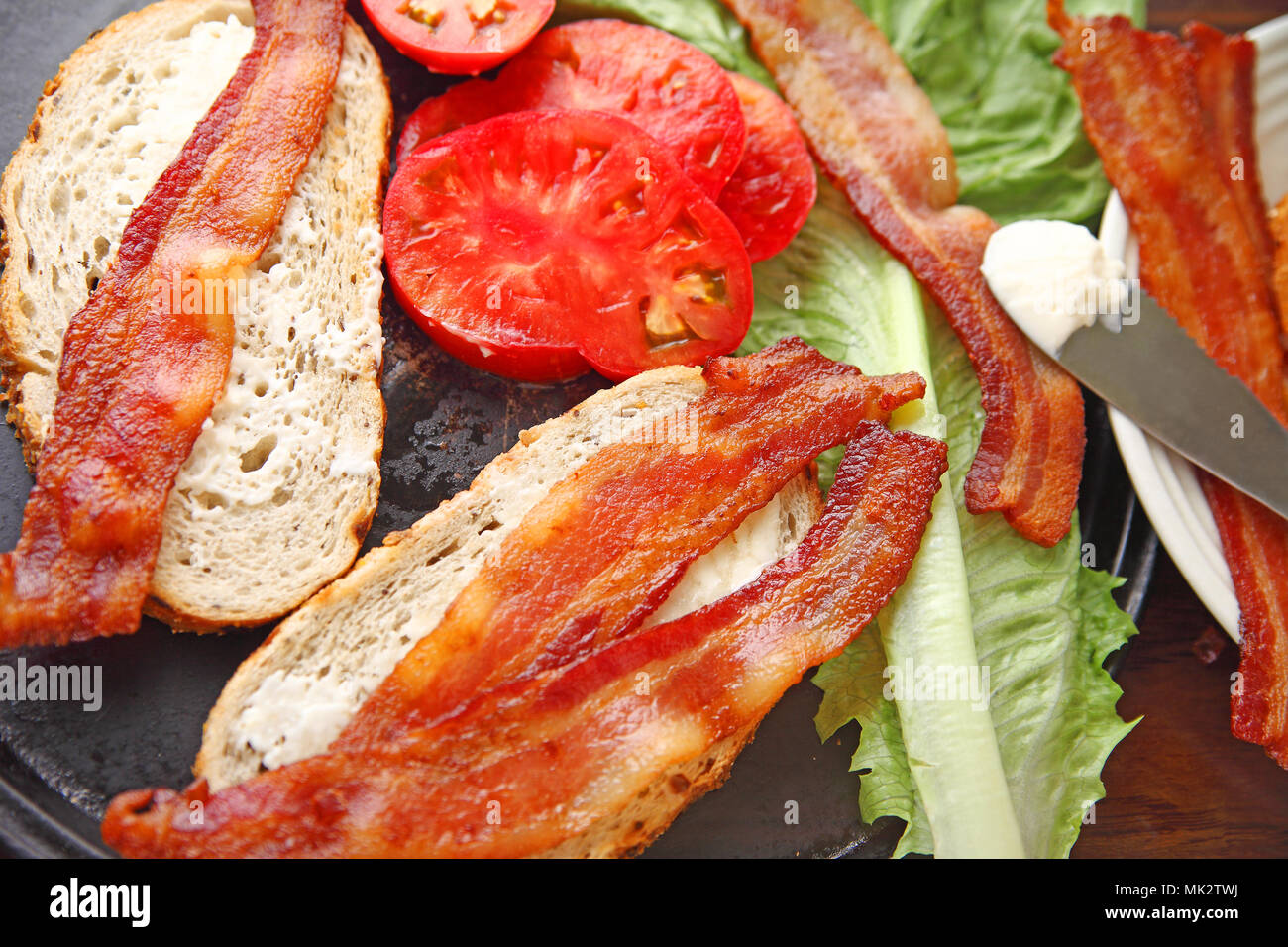 All the items needed to make a bacon, lettuce and tomato sandwich on ...
