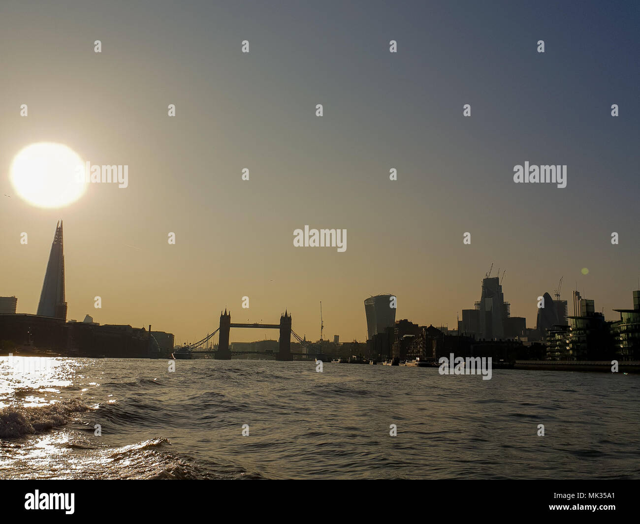 London. UK 6 May 2018 - View of The Shard and Tower Bridge as sun sets ...