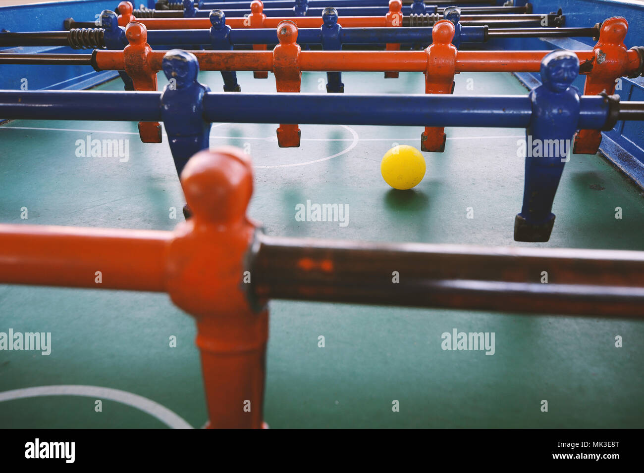Foosball. Soccer table game, blue foosball player. Toy sport game ...