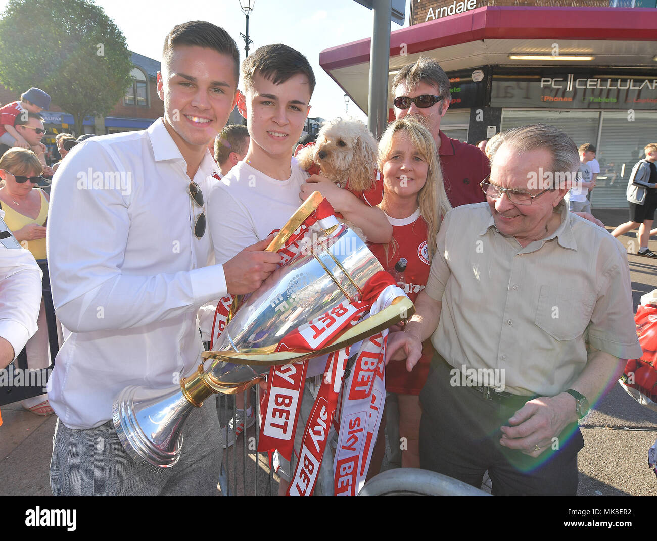 Accrington Stanley's Callum Johnson with his dog and the trophy and his ...
