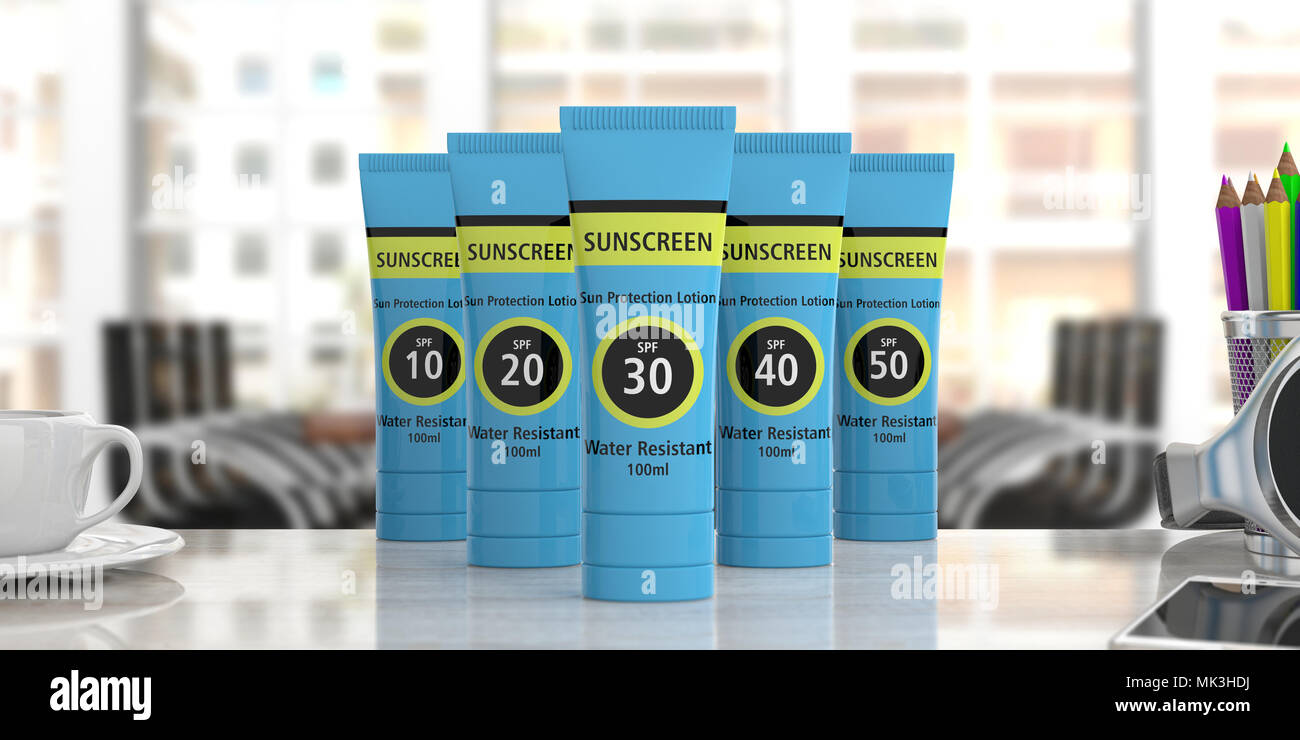 Sunscreen, sun protection lotion on an office desk, blur meeting room ...