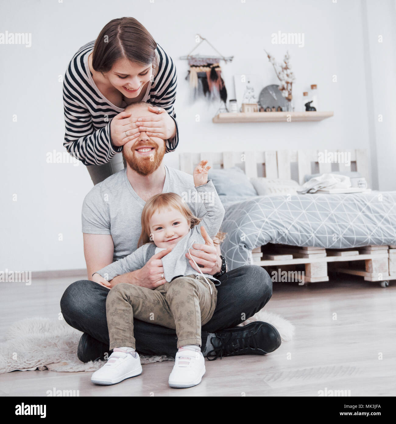 happy family mother, father, child daughter at home Stock Photo - Alamy