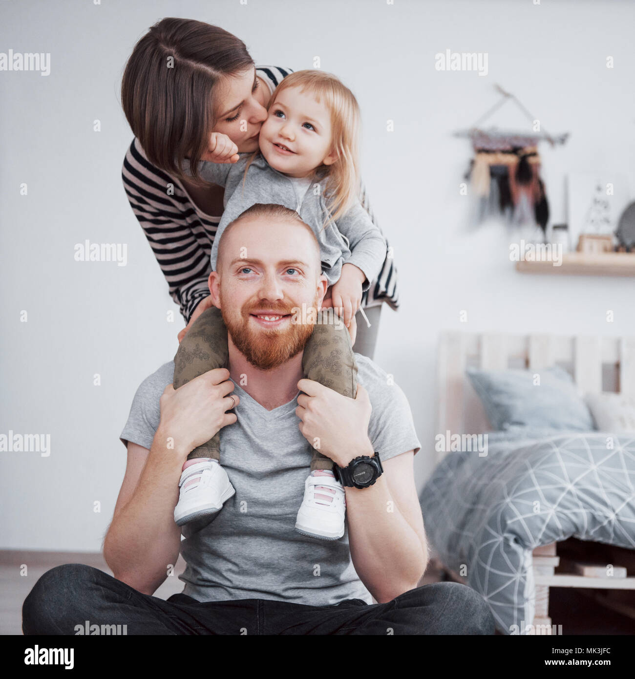 happy family mother, father, child daughter at home Stock Photo - Alamy