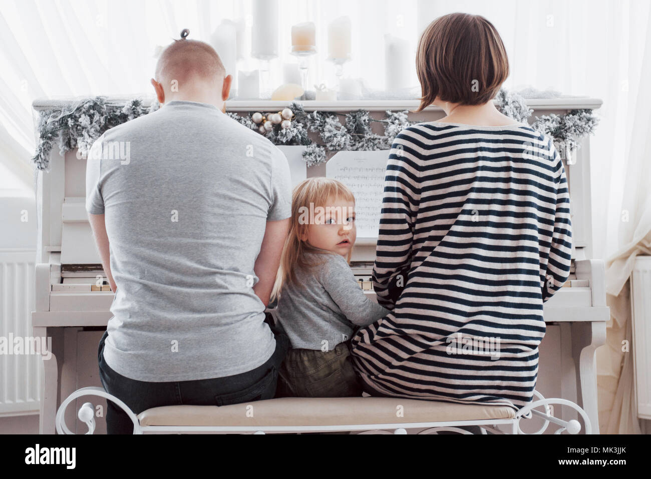 Baby sitting from behind hi-res stock photography and images - Alamy