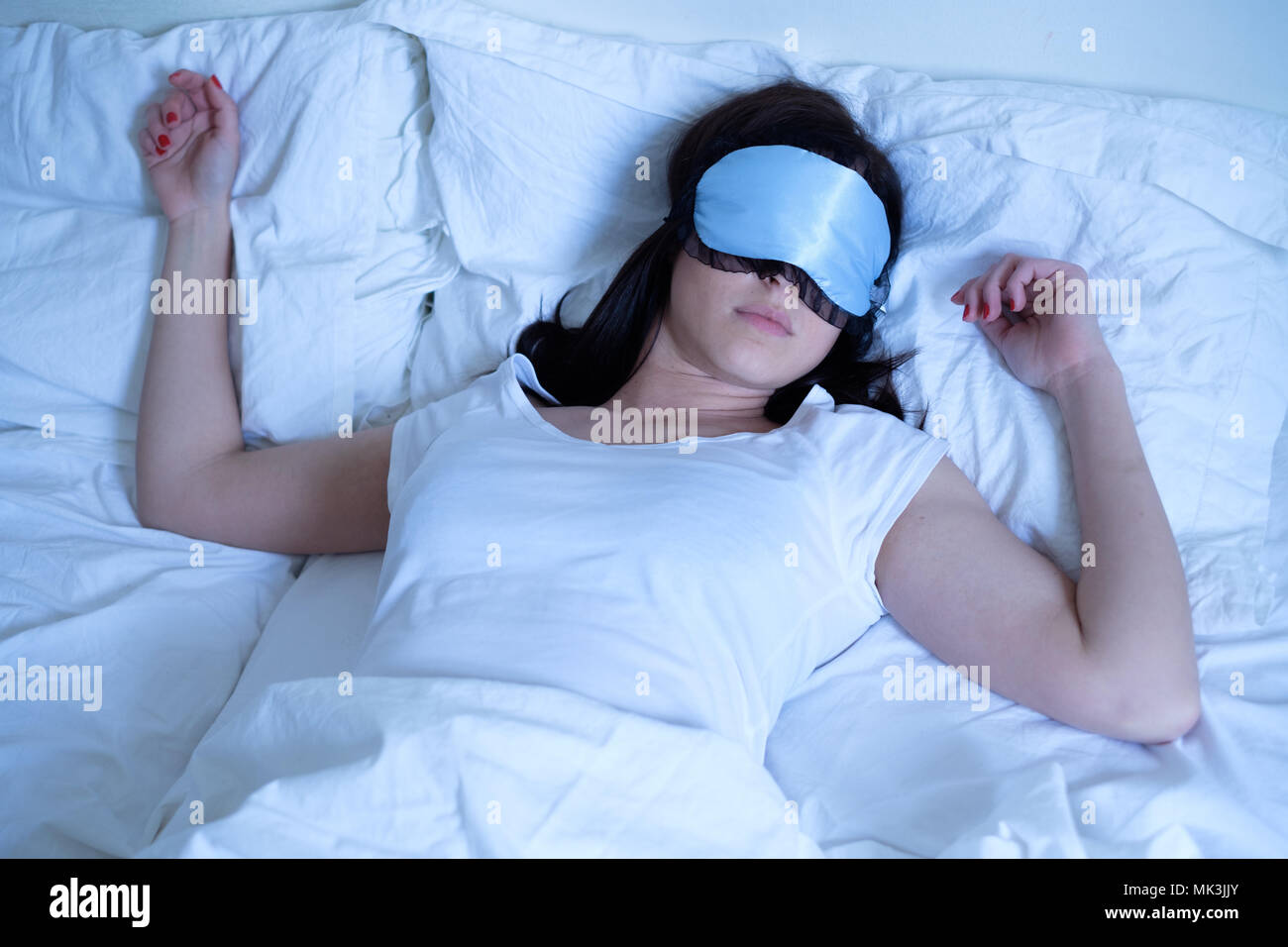 Woman sleep mask bed hi-res stock photography and images - Alamy