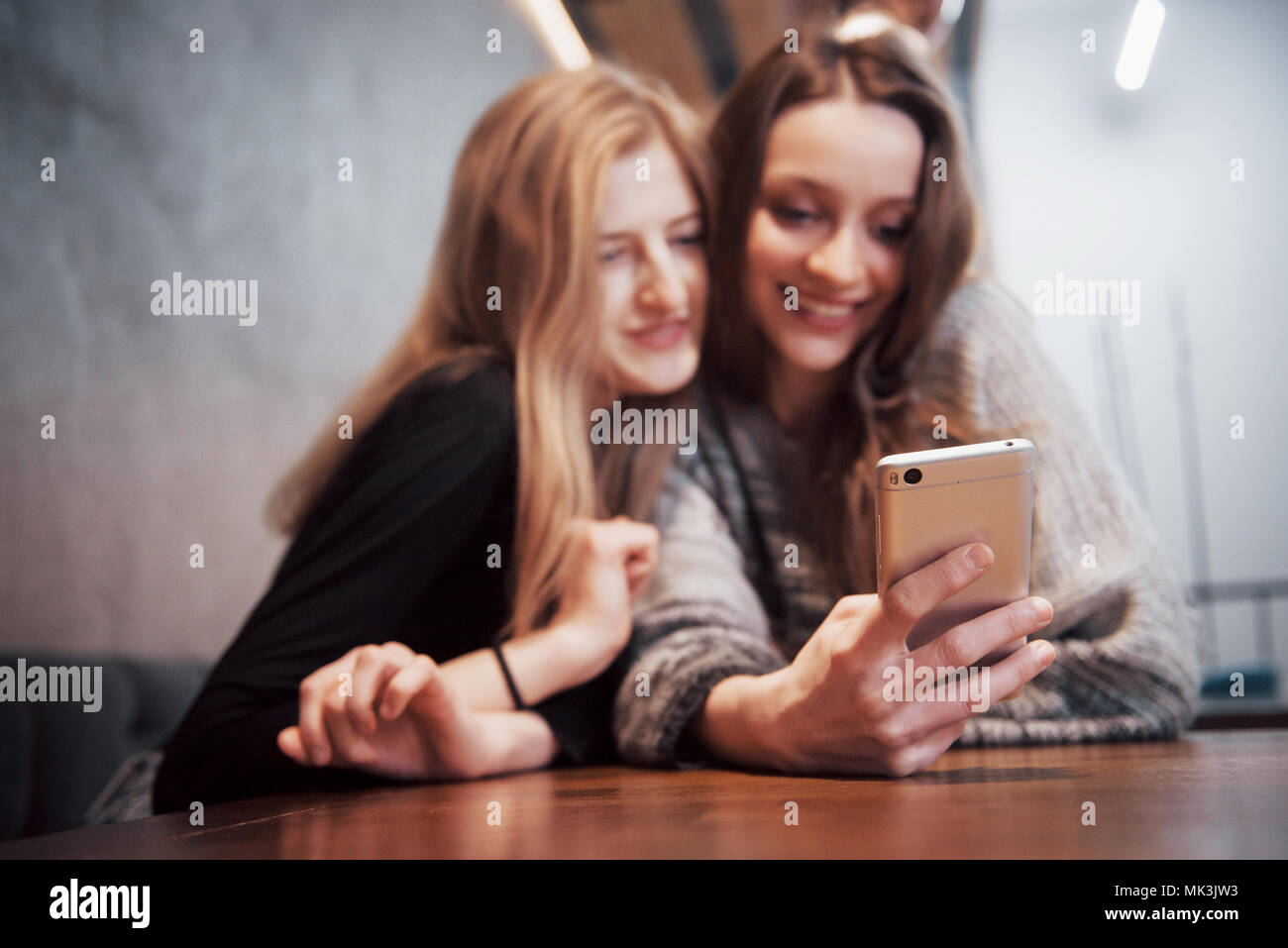 Two people one cell hi-res stock photography and images - Alamy