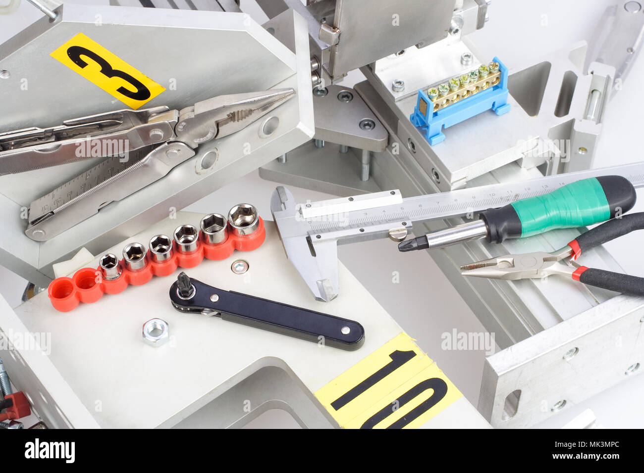 screwdriver, screw, nuts - repair of industrial equipment Stock Photo ...