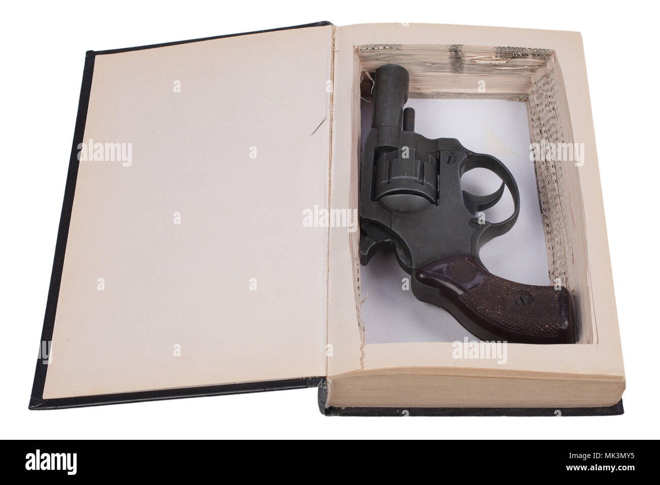 revolver gun hidden in a book isolated on white background Stock Photo ...