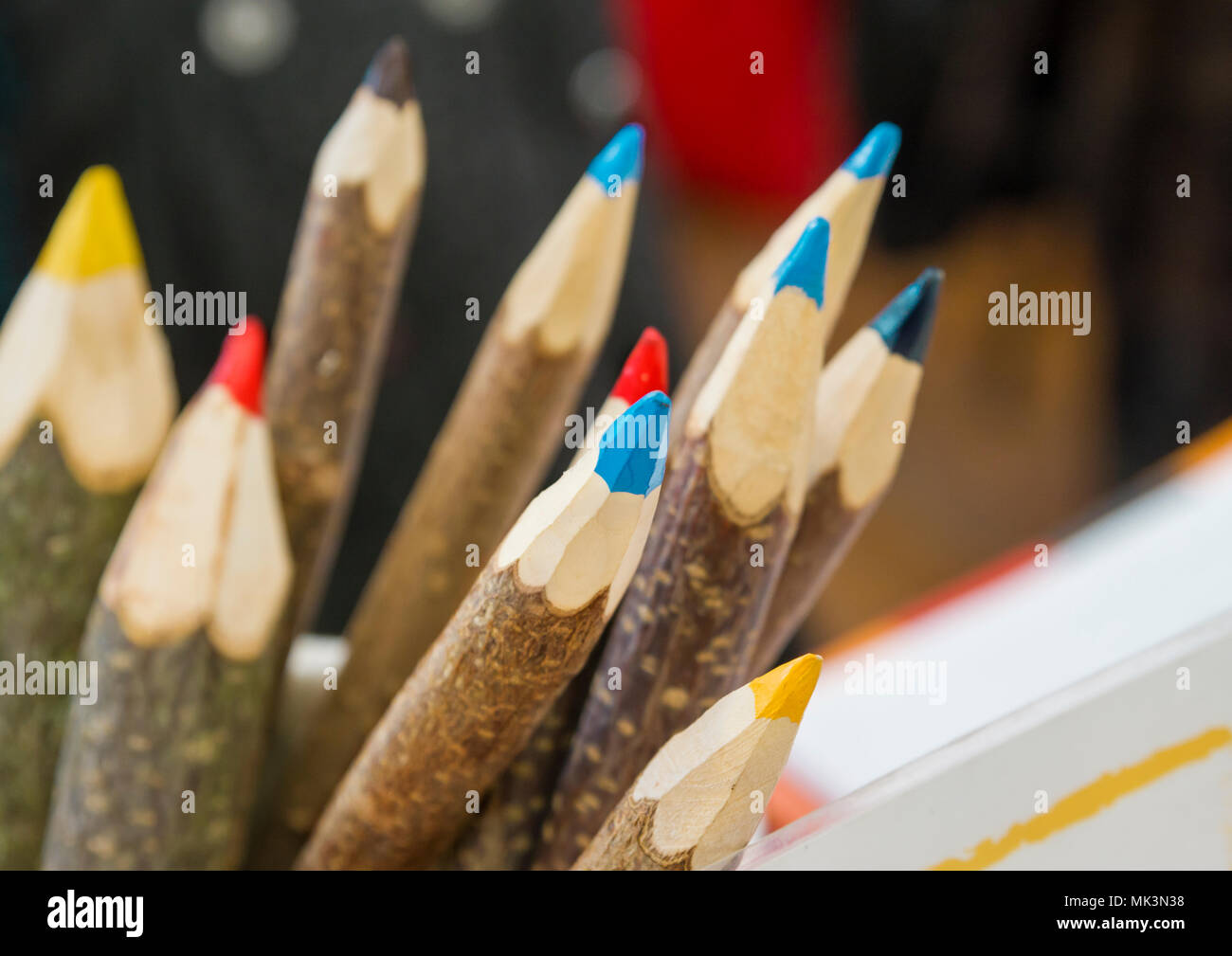 Wooden colored pencils made of bark of a tree Stock Photo - Alamy