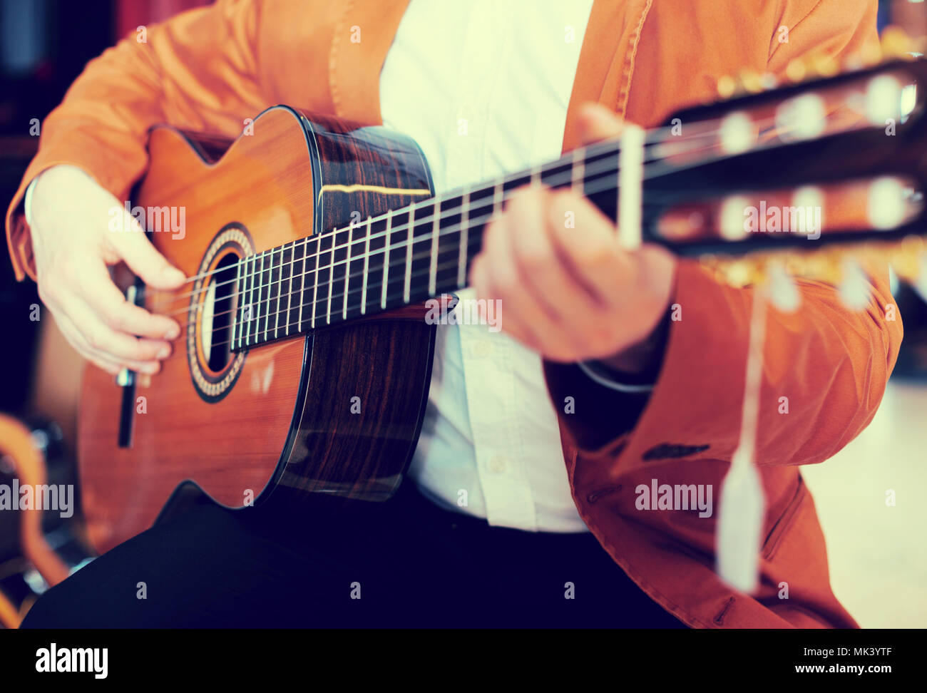 Professional guitarist practicing before the performing on guitar Stock ...