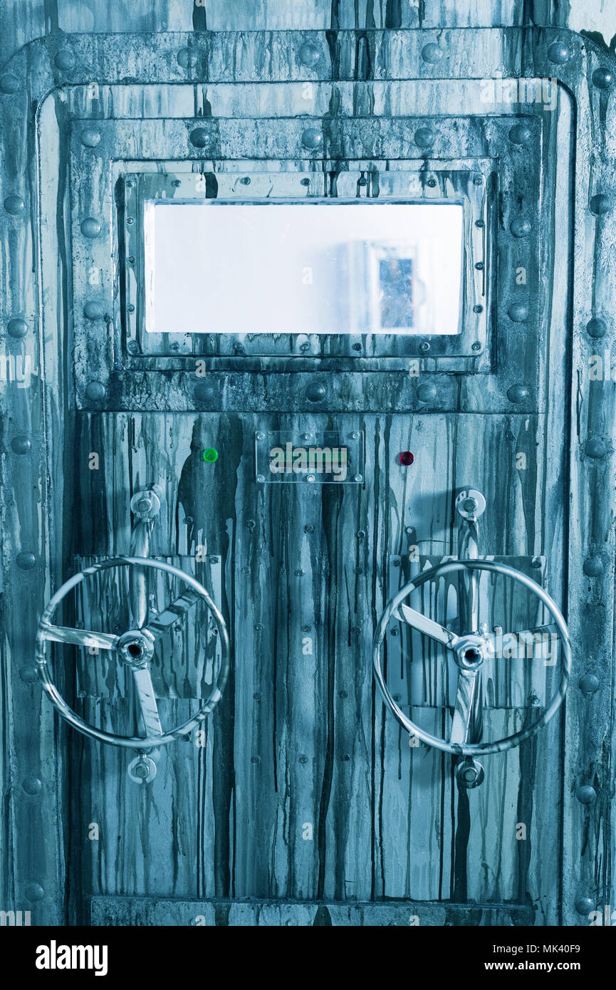 Image of locked grey door of lab in lost room Stock Photo - Alamy