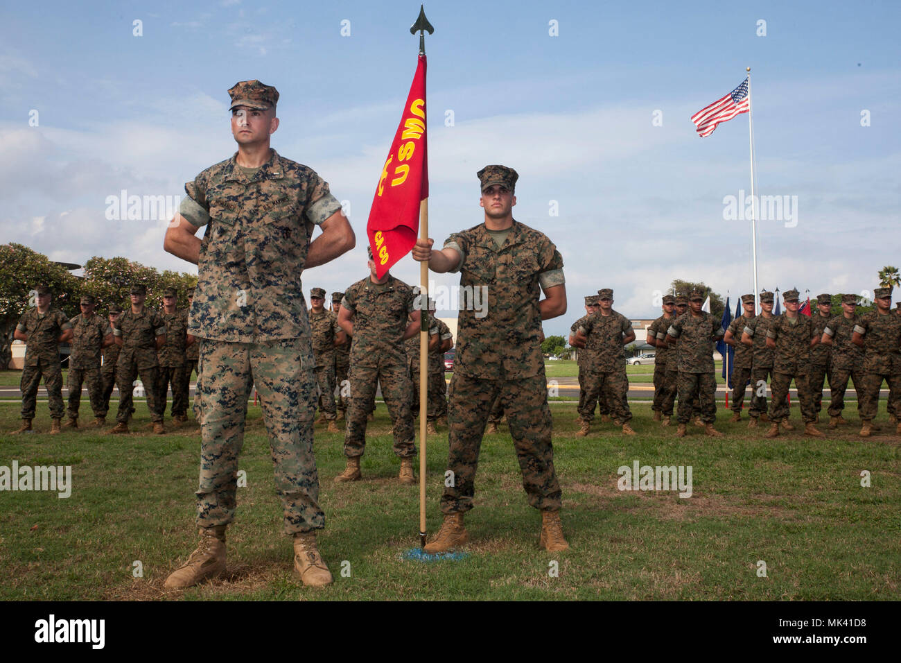 U.S. Marines with 3rd Marine Regiment stand at parade rest during a ...