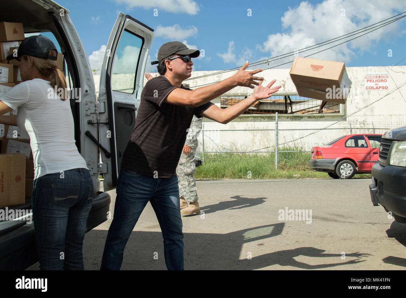 CEIBA, Puerto Rico – Misael Alvarez, a volunteer at a distribution ...