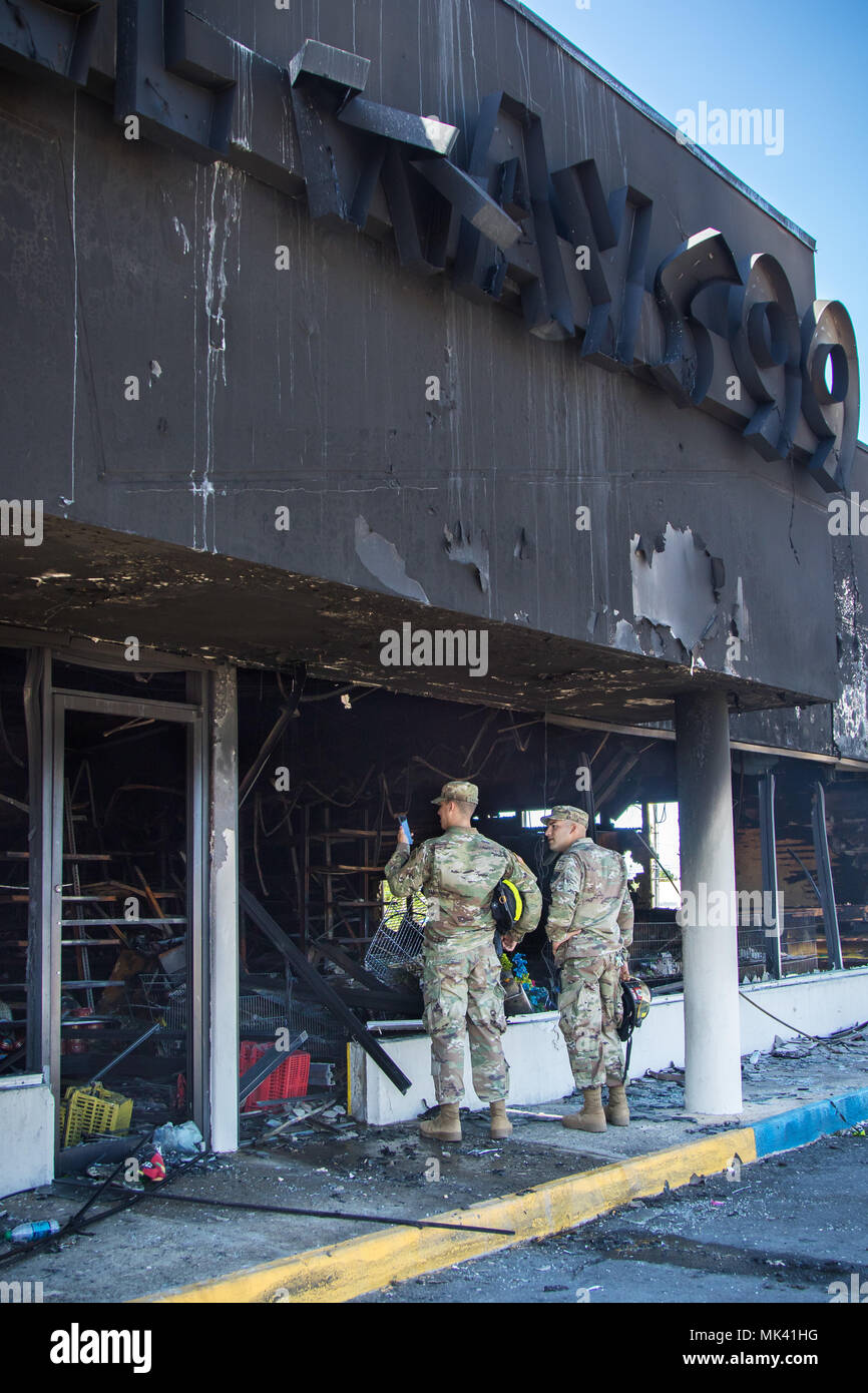 VEGA BAJA, Puerto Rico-- Pfc. Jean Cordona, left, and Spc. Gilberto ...