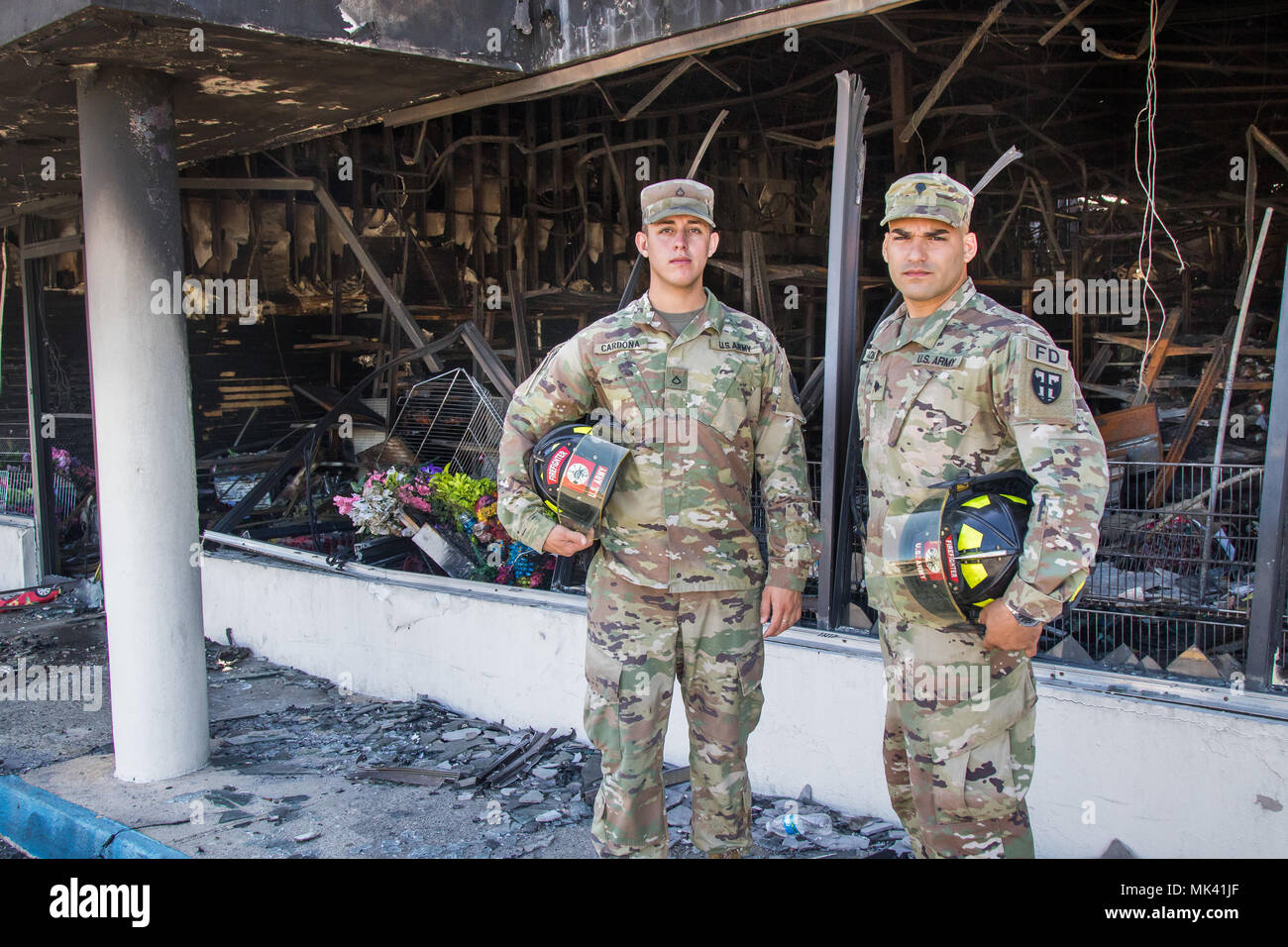 VEGA BAJA, Puerto Rico-- Pfc. Jean Cordona, left, and Spc. Gilberto ...