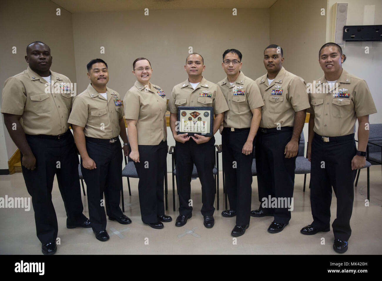 Nominees for the Sailor of the Year program pose with U.S. Navy HM1 ...
