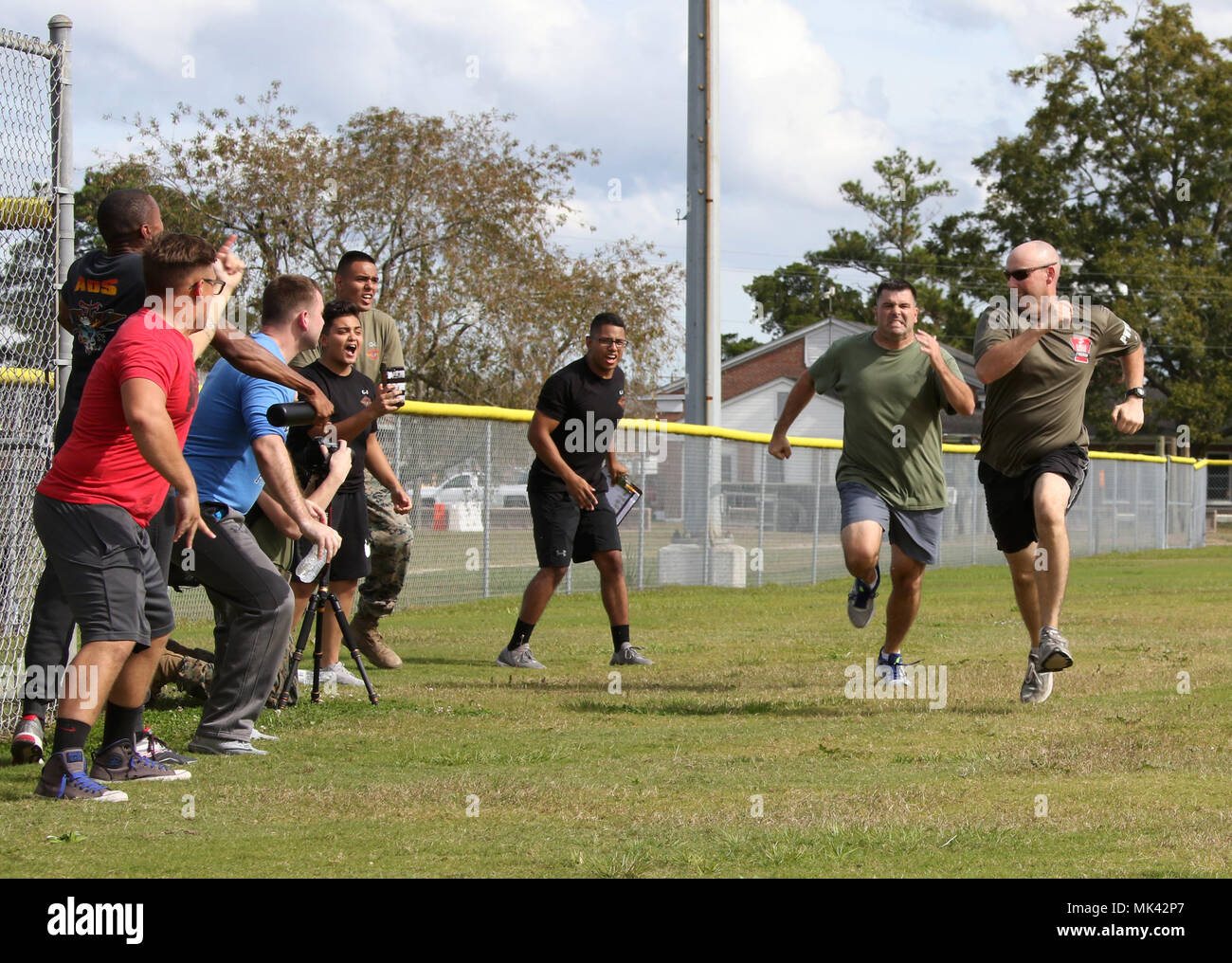 Lt. Col. Ryan Shadle, second from right, races Lt. Col. Jason Donovan ...