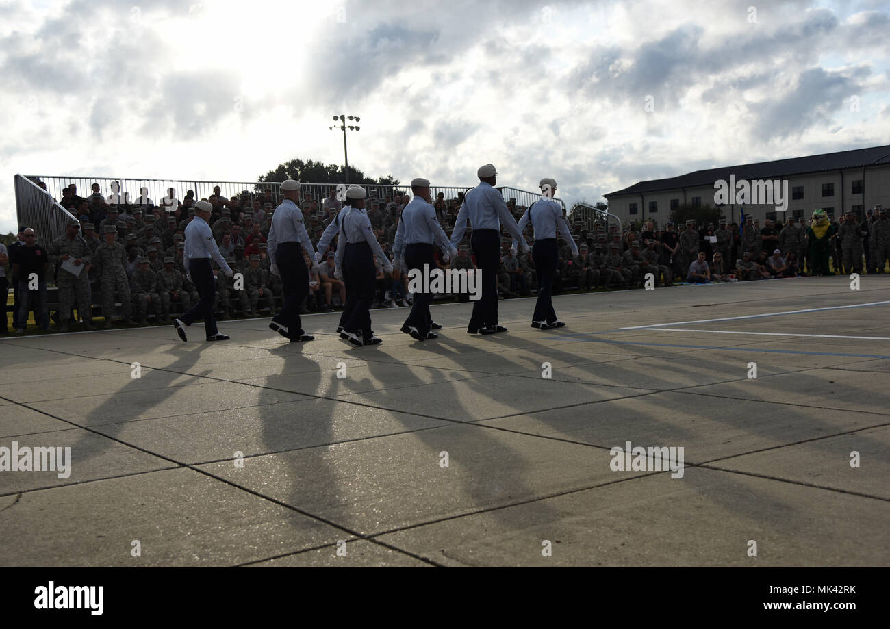 Members of the 334th Training Squadron regulation drill team perform ...