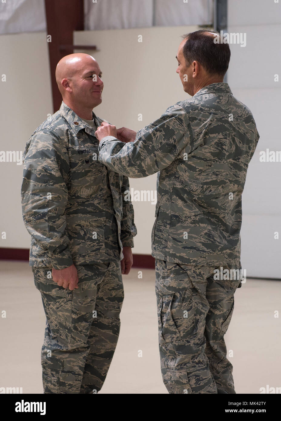 Brig. Gen. Brad B. Richy pins Maj. Tony S. Vincelli, former commander ...