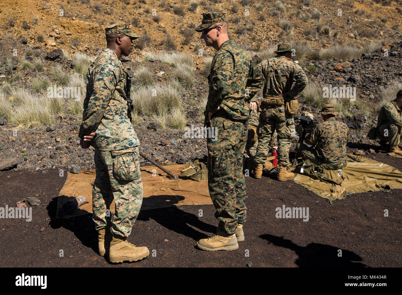 Col. Michael Styskal speaks to Staff Sgt. Peter Parris during a live ...