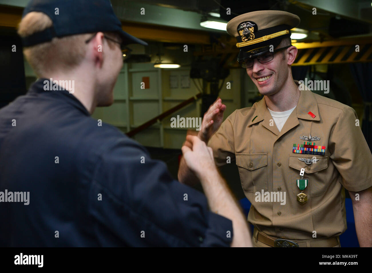 INDIAN OCEAN (Nov. 1, 2017) U.S. Navy Ensign Kenneth Kuper (right ...