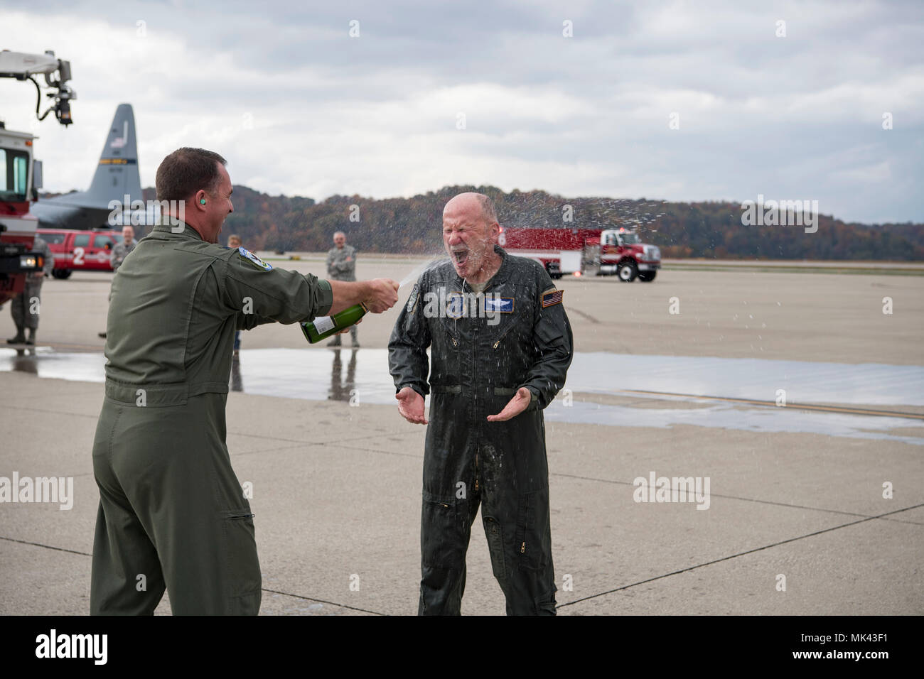 Lt. Col. Scott Lowe, a pilot with the 130th Airlift Wing, sprays Chief ...