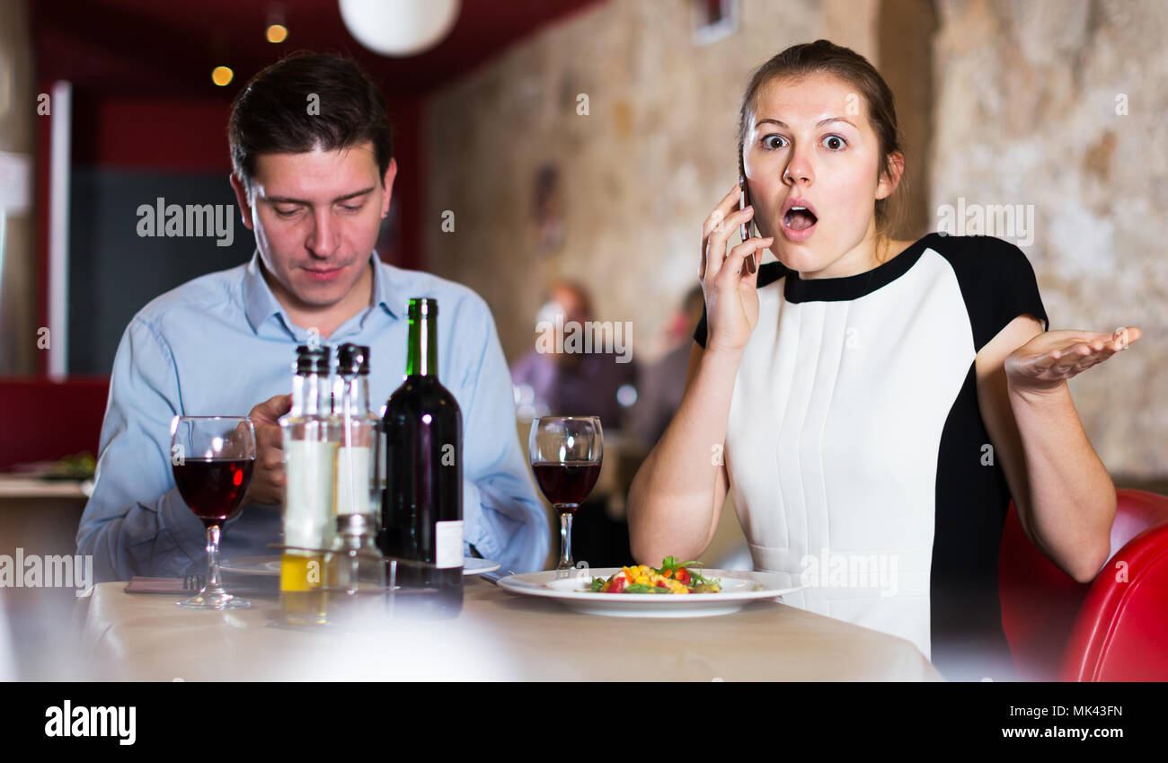 Man speaking with friends at restaurant hi-res stock photography and ...