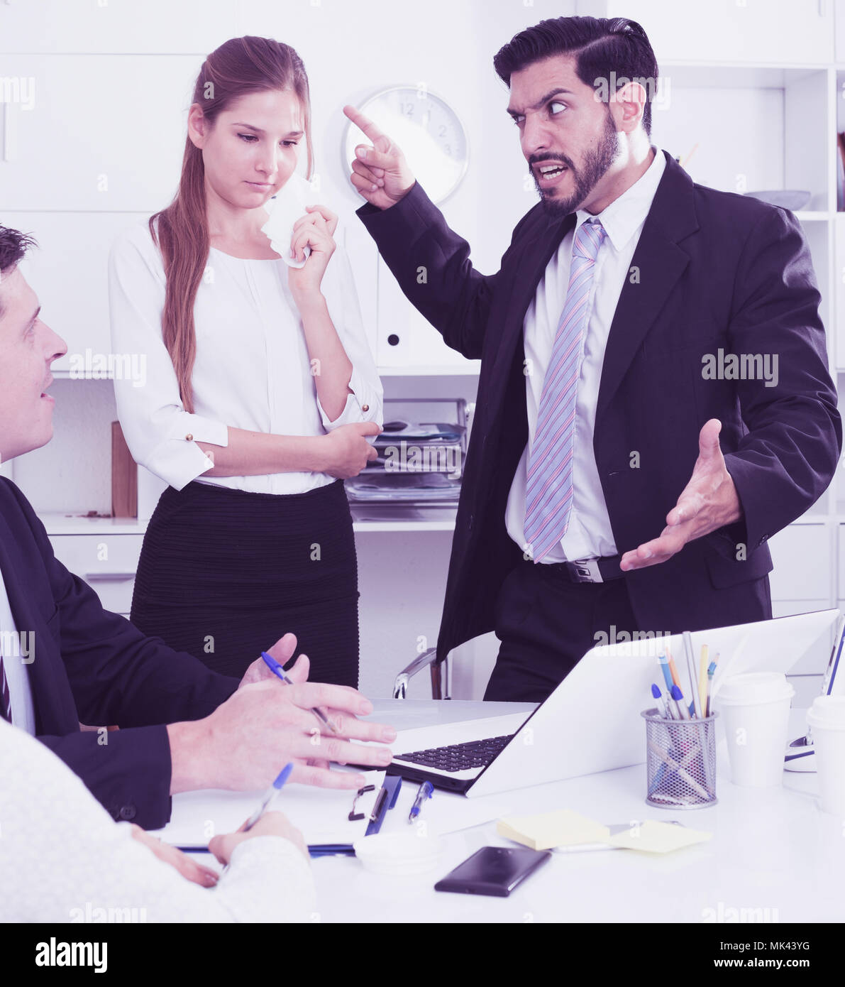 Irritated boss scolding subordinates pointing out shortcomings and ...