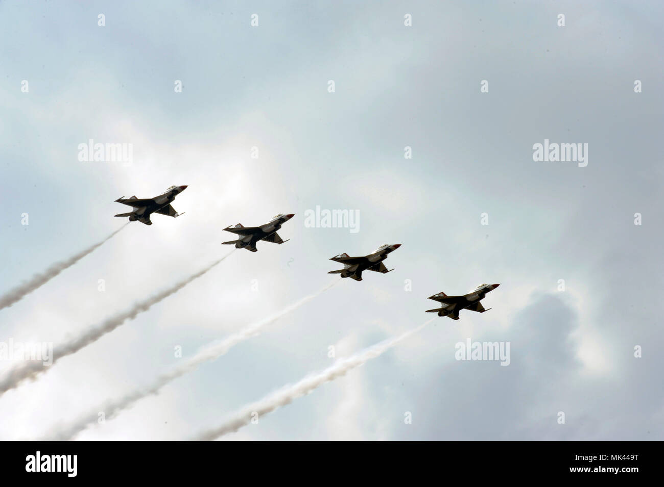 The U.S. Air Force Thunderbirds fly in formation over the Joint Base ...
