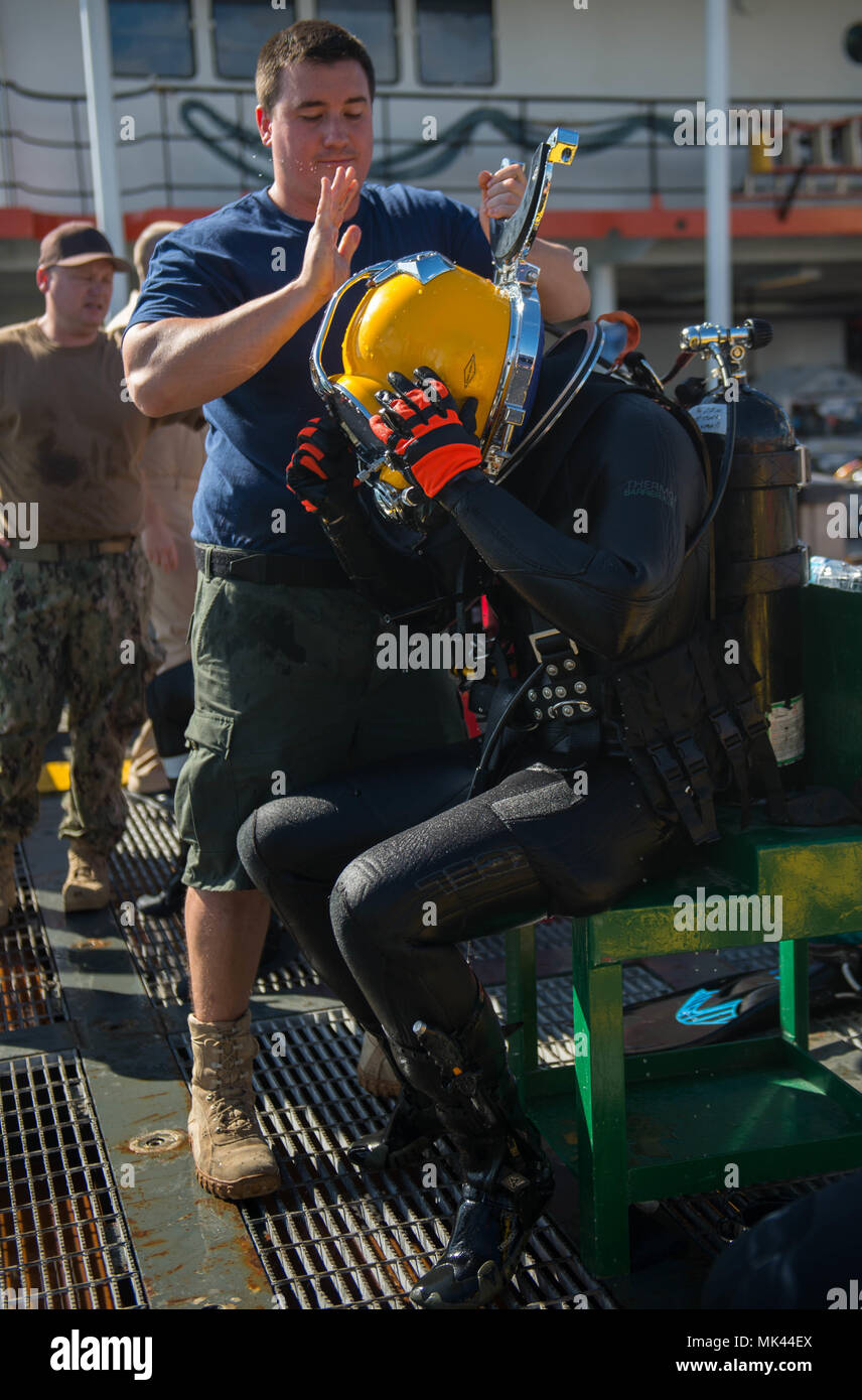 SAN DIEGO (Nov. 04, 2017) Navy Diver 2nd Class Austin Hughes, left, and ...
