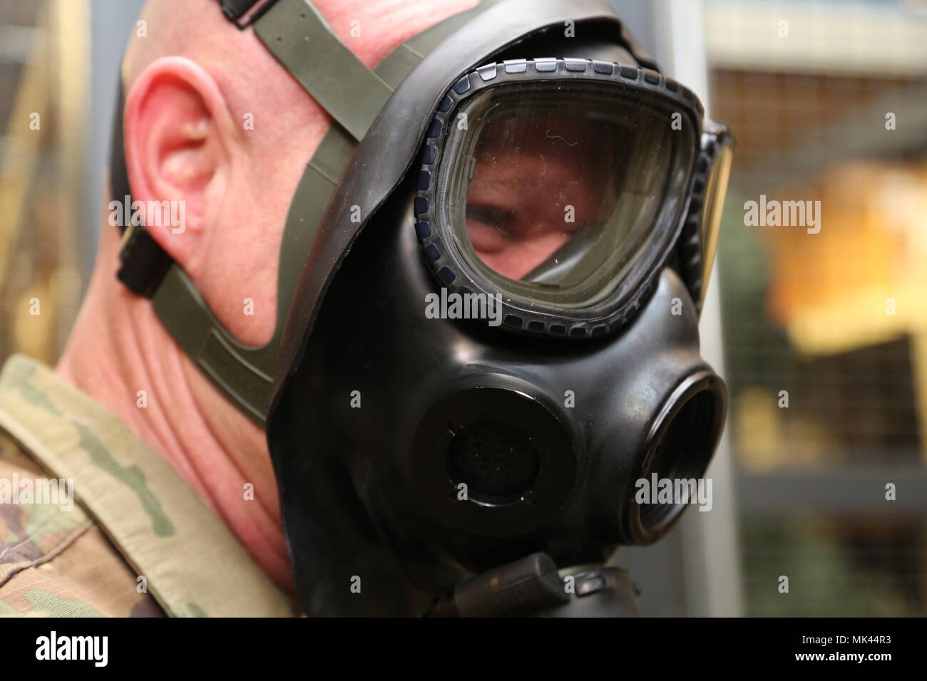 Sgt. Maj. Scott Ward of the 352nd Civil Affairs Command ensures his ...