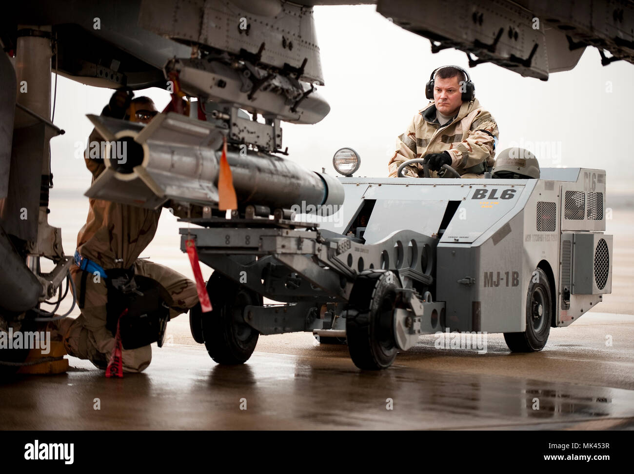 Tech Sgt. Matthew Amberg, left, and Staff Sgt. Adam Young, right, from ...