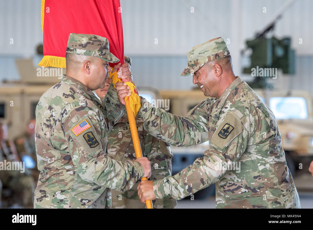 Col. Moses Kaoiwi, Jr. receives the colors during the 29th Infantry ...