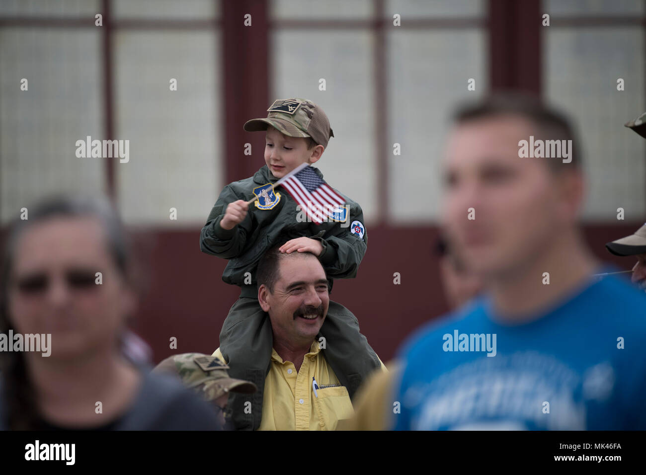 Members of the 130th Airlift Wing return from an overseas deployment ...
