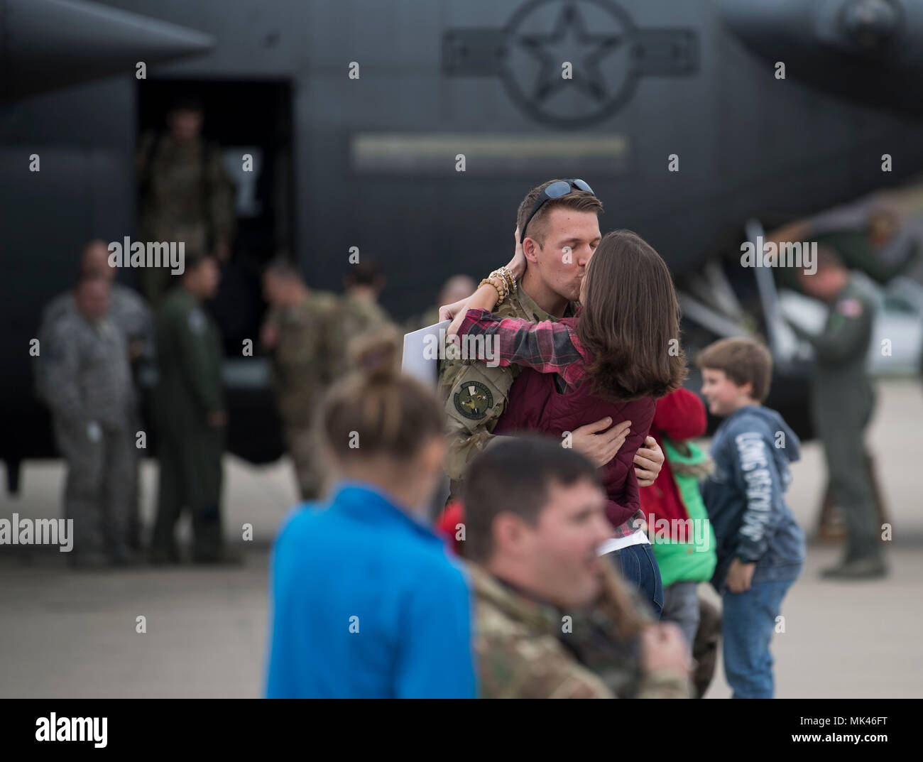 Members of the 130th Airlift Wing return from an overseas deployment ...