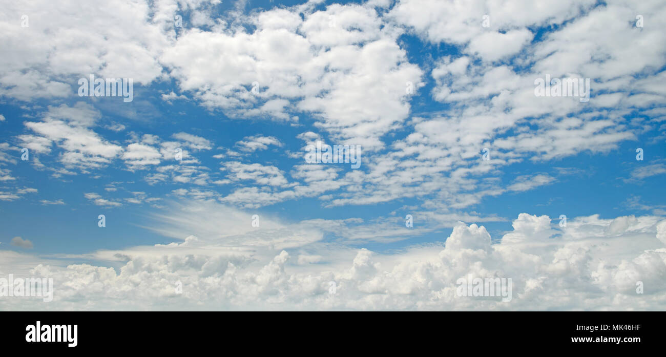Bright white clouds on a background of blue sky Stock Photo - Alamy