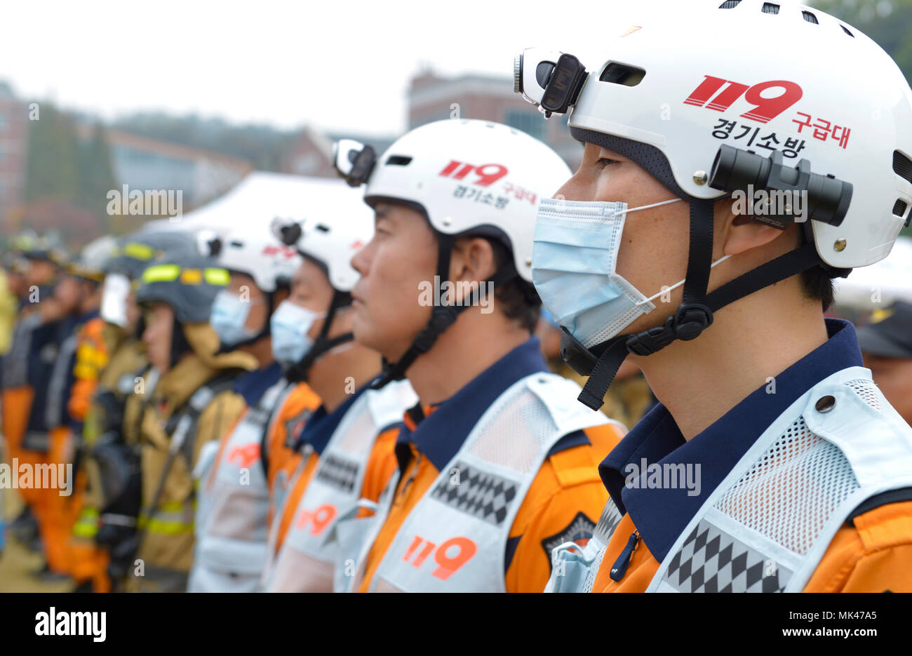 Korean emergency medical services listen during the closing ceremony of a bilateral, mass ...