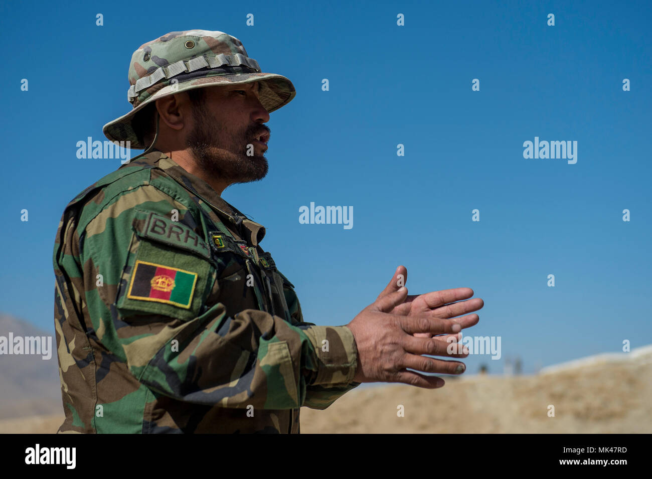An Afghan Commando provides instruction on urban operations at the ...