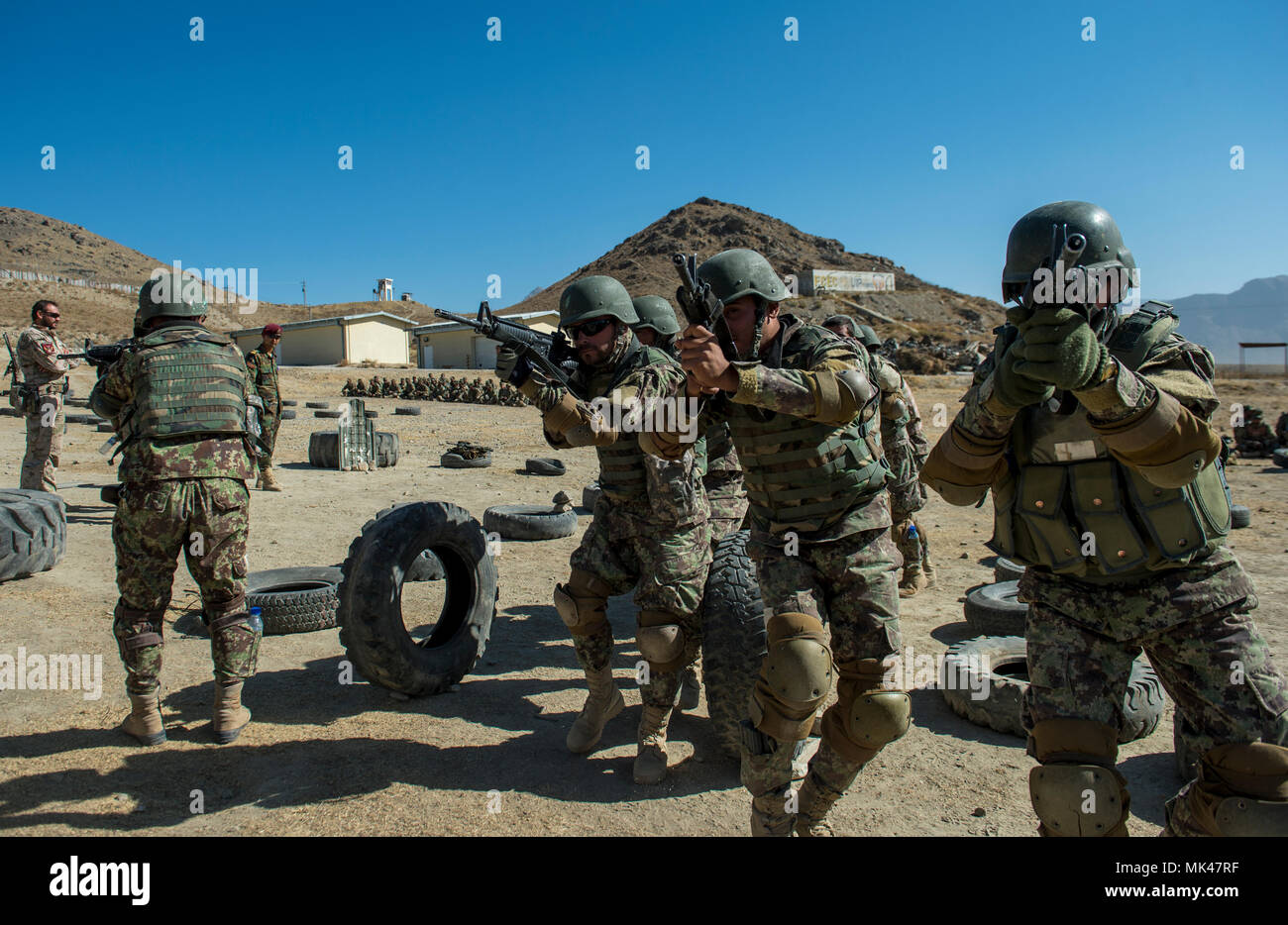 An Afghan squad conducts room clearing rehearsals during Commando ...